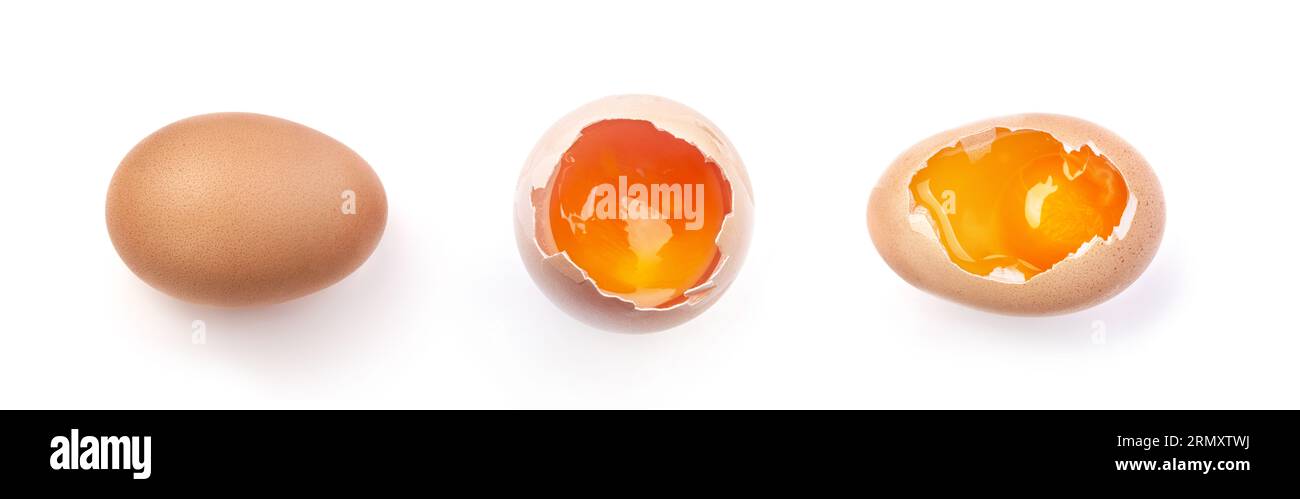 Egg yolk in the shell isolated on white background Stock Photo - Alamy
