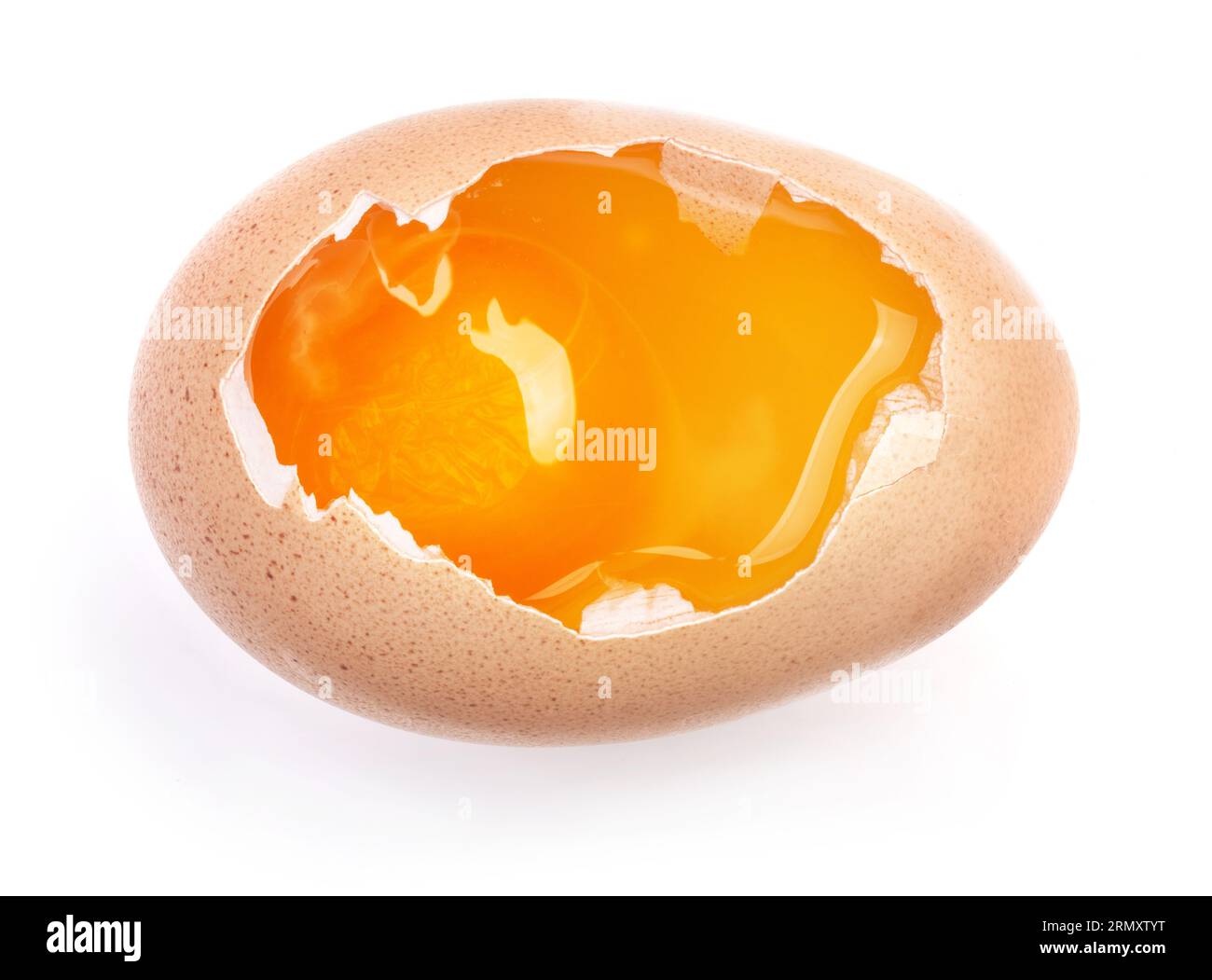 Egg yolk in the shell isolated on white background Stock Photo - Alamy