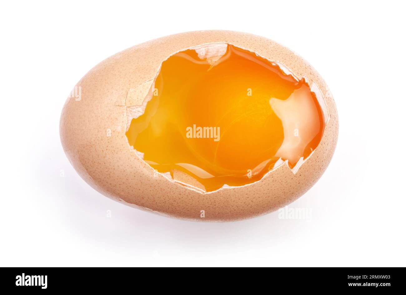 Egg yolk in the shell isolated on white background Stock Photo - Alamy