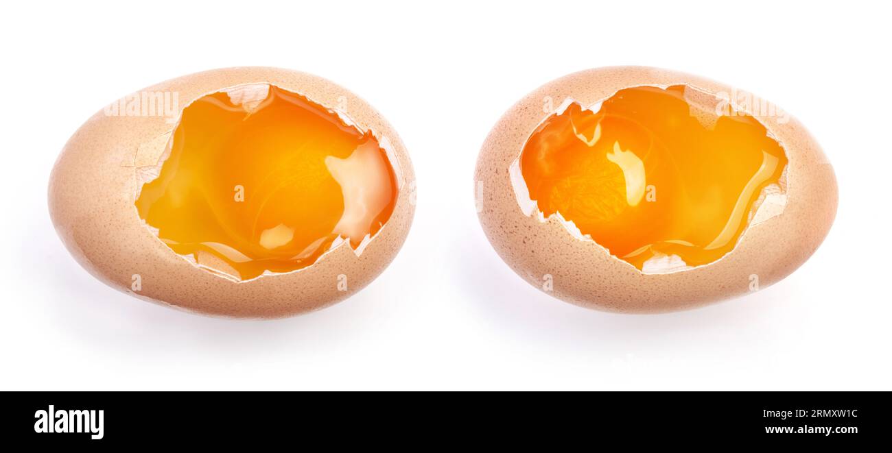 Egg yolk in the shell isolated on white background Stock Photo - Alamy
