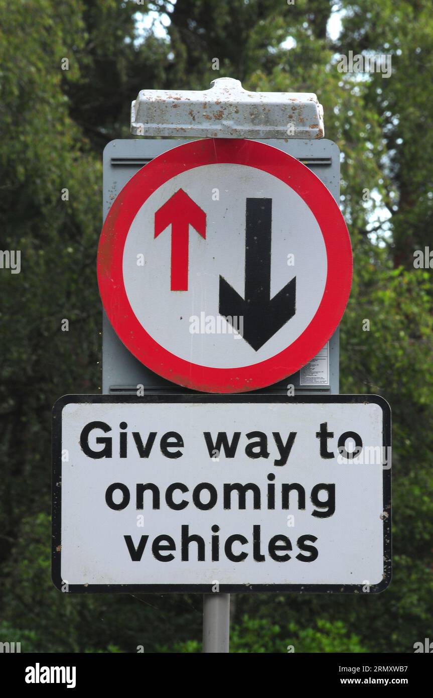 Give way to oncoming traffic road sign Stock Photo - Alamy Give way to oncoming traffic road sign Stock Photo - Alamy
