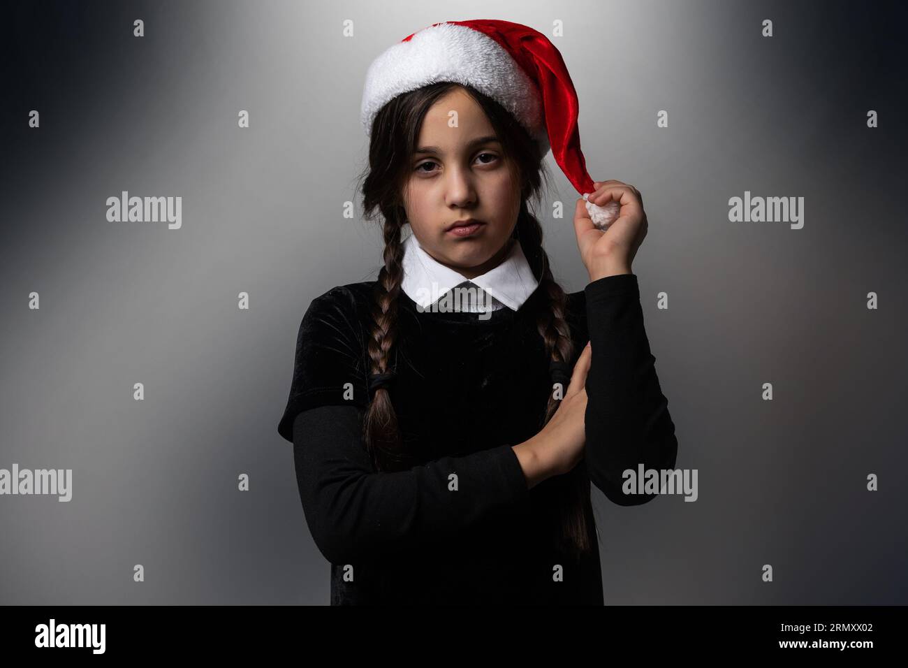 Portrait of little girl with Wednesday Addams costume. Wednesday girl ...