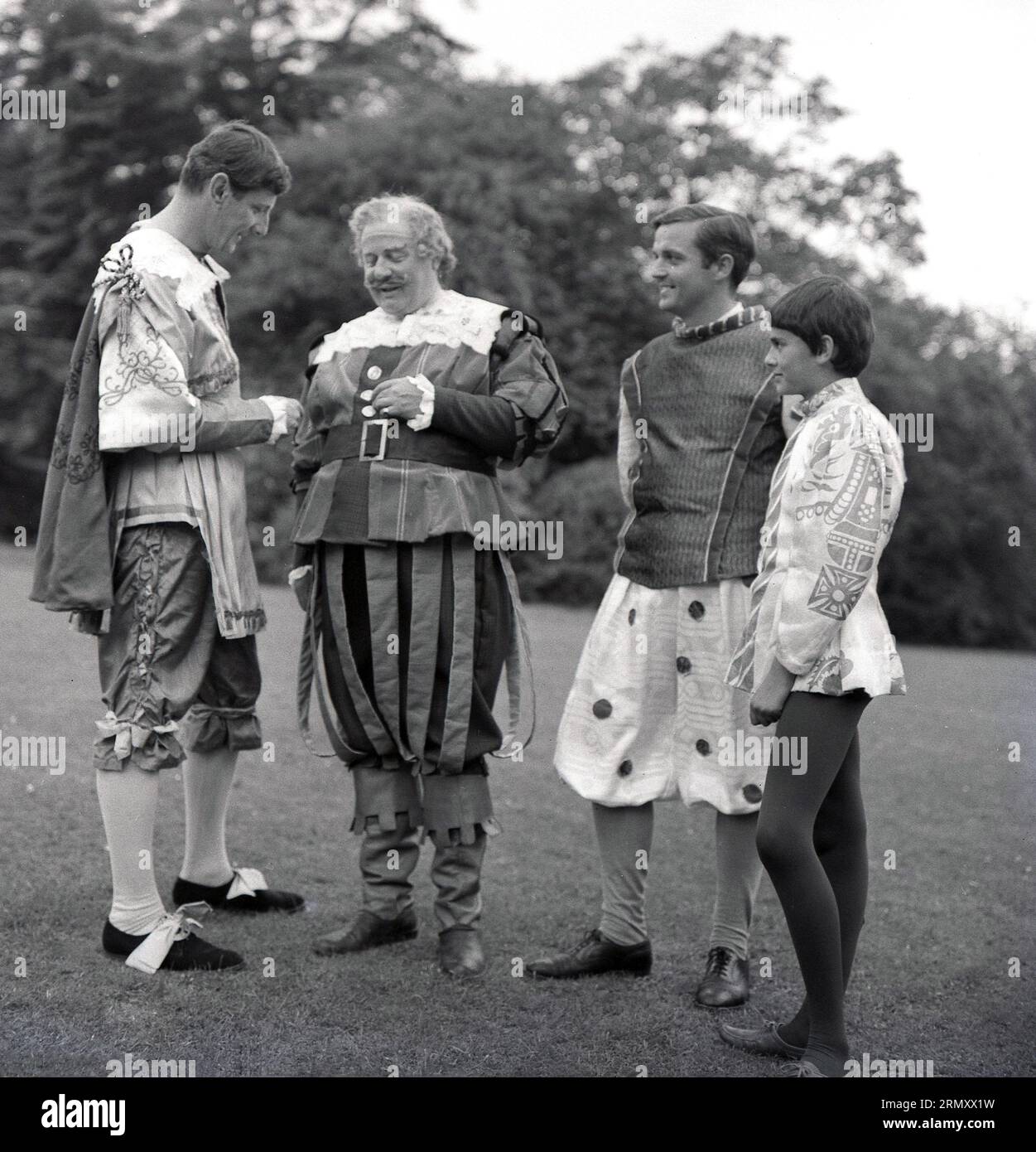 1965, historical, three adult male actors and one teenage boy wearing ...