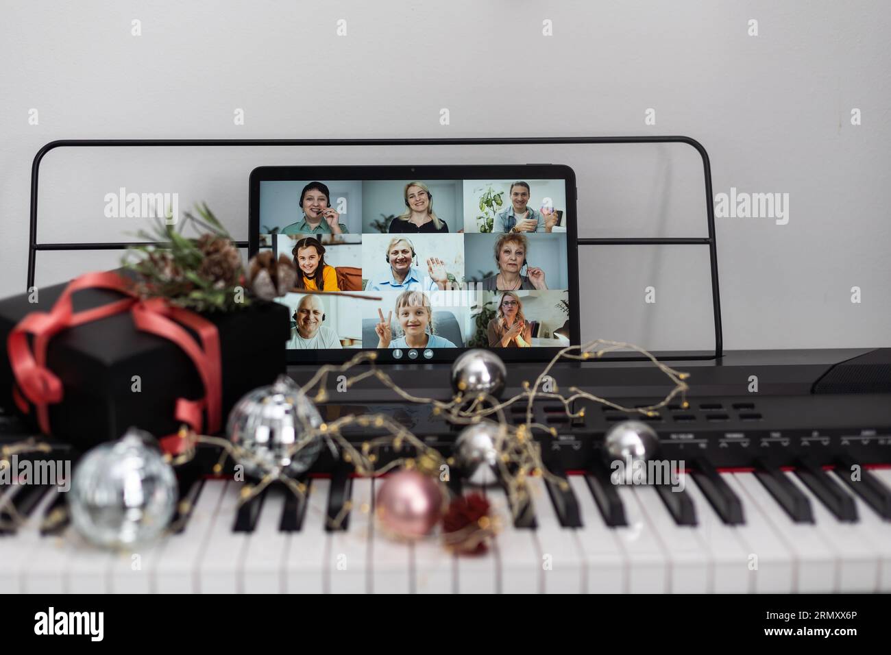 Christmas video call tablet. synthesizer, piano keys Stock Photo - Alamy