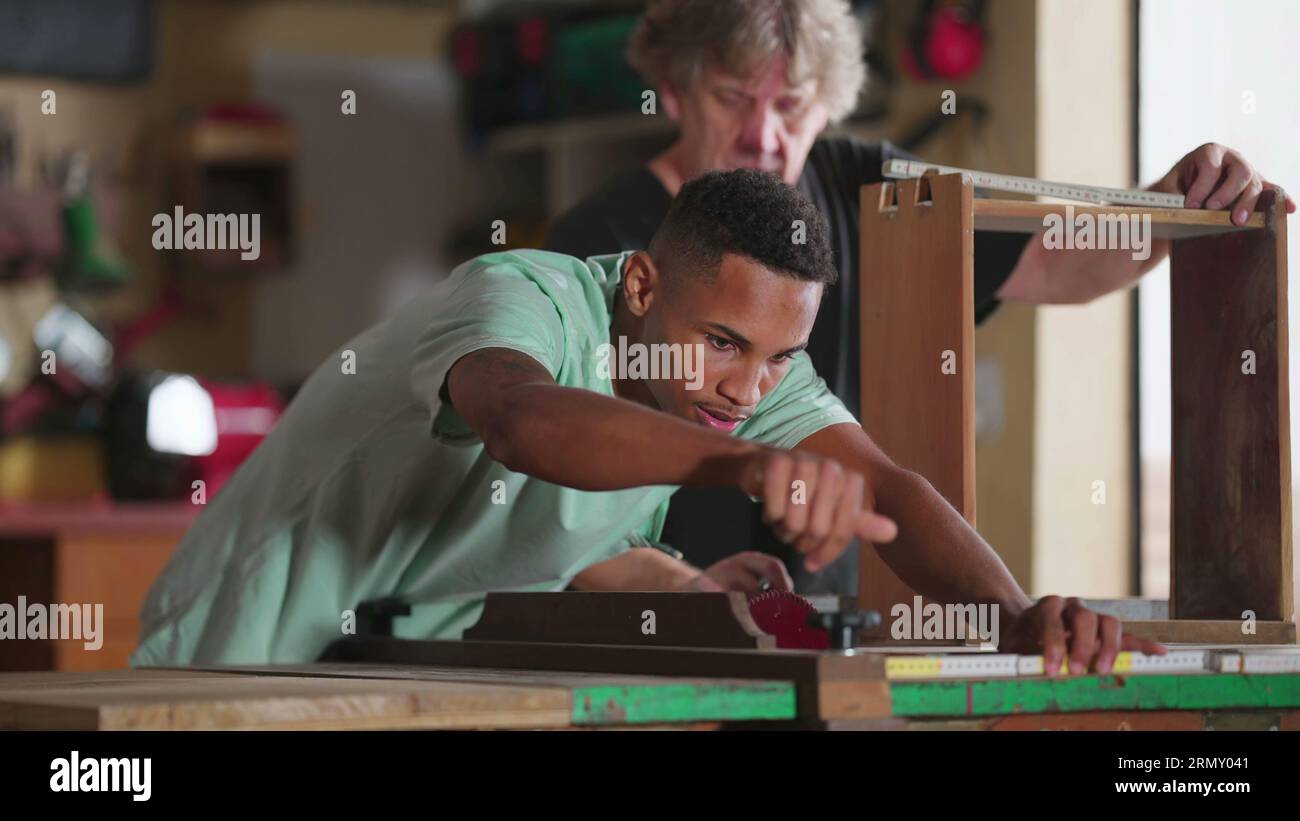 Candid scene carpenters working hi-res stock photography and images - Alamy
