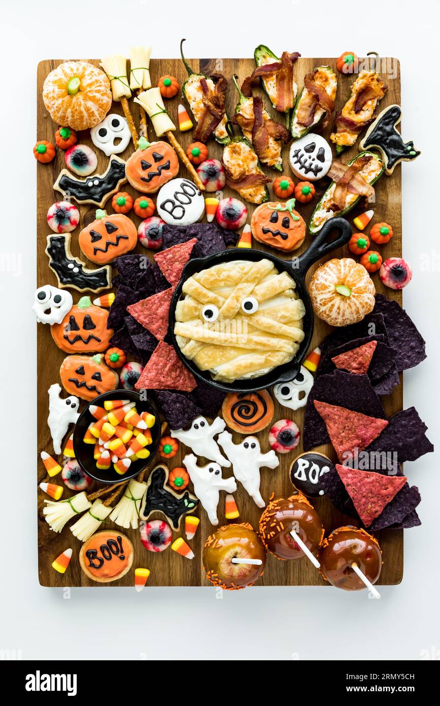 A halloween charcuterie board filled with spooky edible critters Stock ...