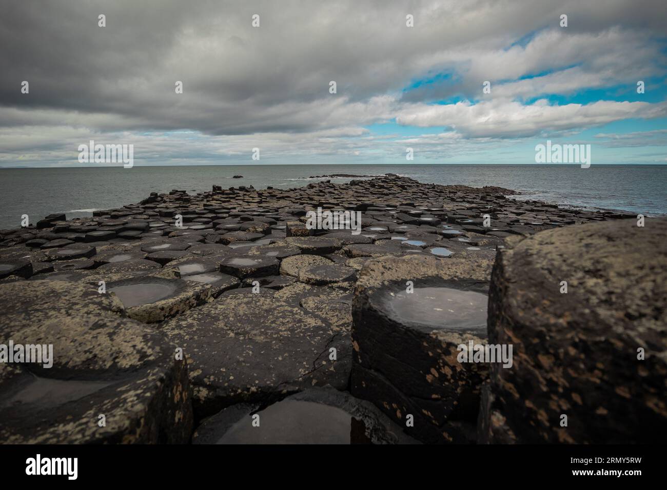 Panorama of hexagonal stones or pillars at Giants causeway in northern ...