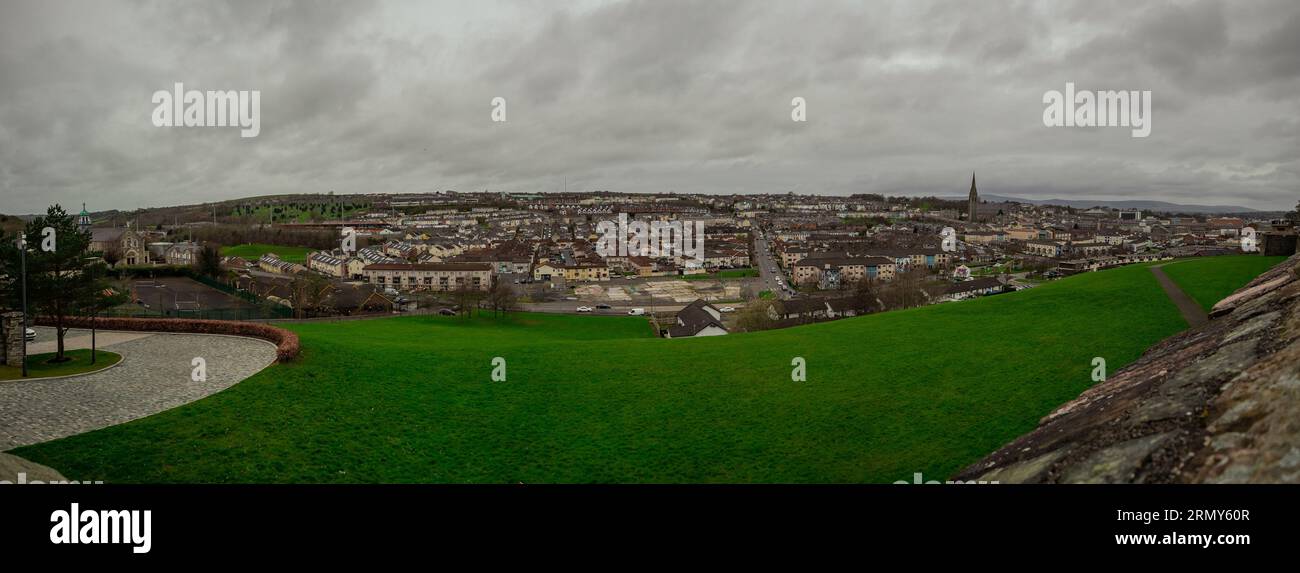 Wide panorama of Derry or Londonderry on a cloudy day viewed from the ...