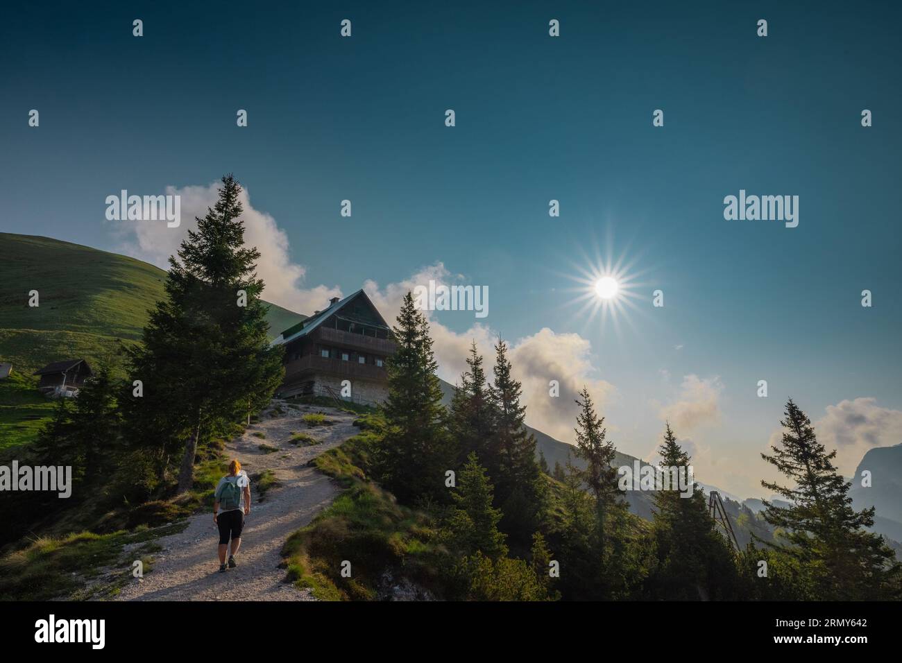 Beautiful alpine hut on Golica mountain visible from below.Nice forest ...
