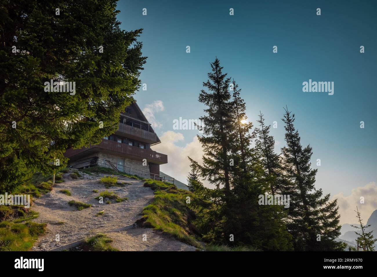 Beautiful alpine hut on Golica mountain visible from below.Nice forest ...