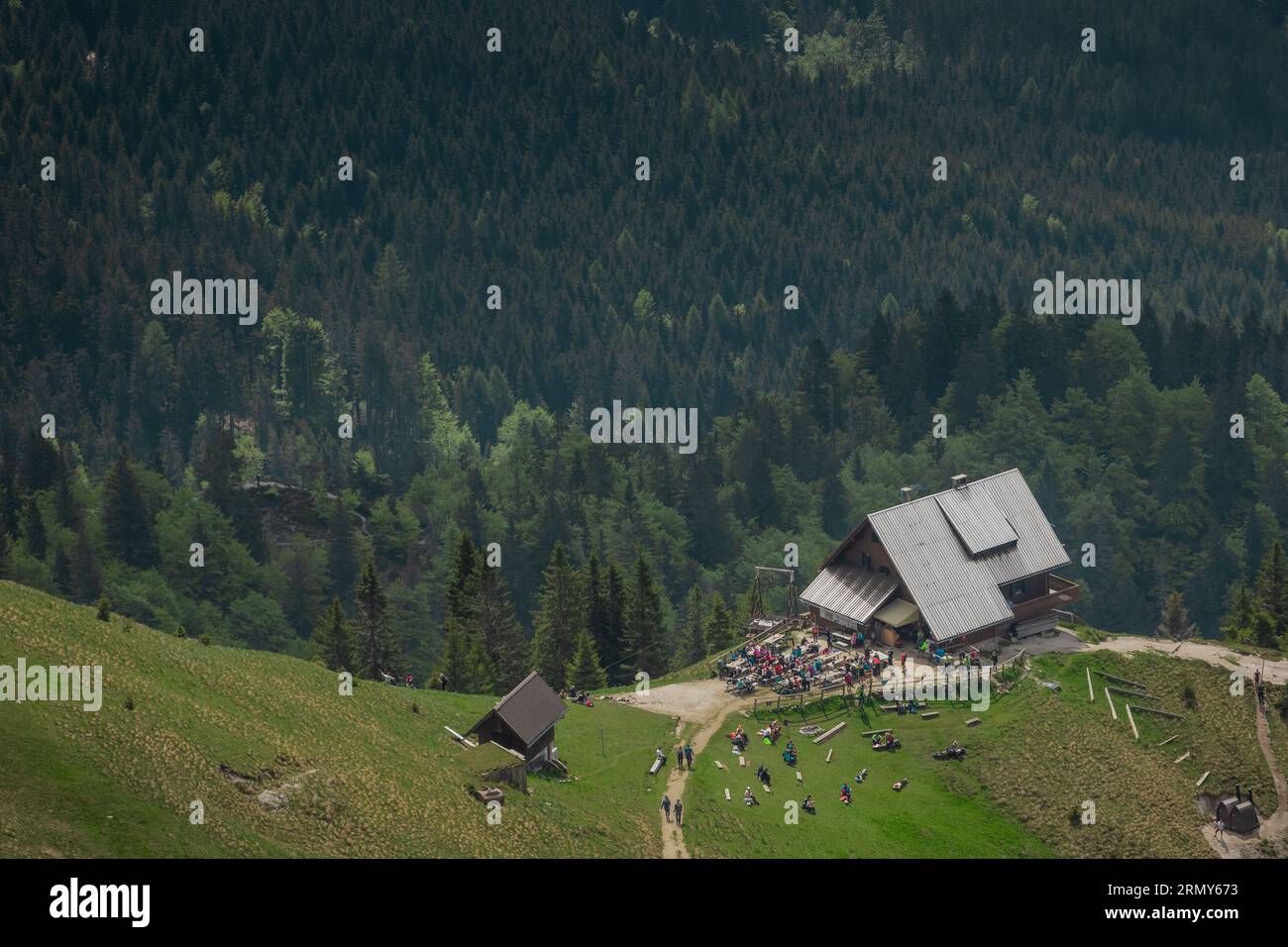 Beautiful alpine hut on Golica mountain visible from above. Nice forest ...
