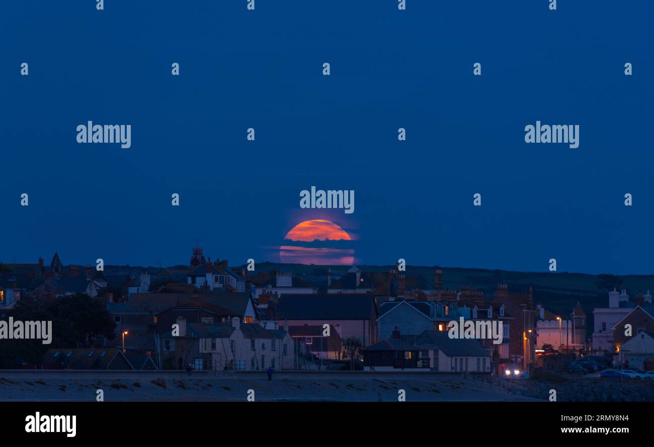A rare super moon rises over the market town of Marazion, Cornwall 30 ...