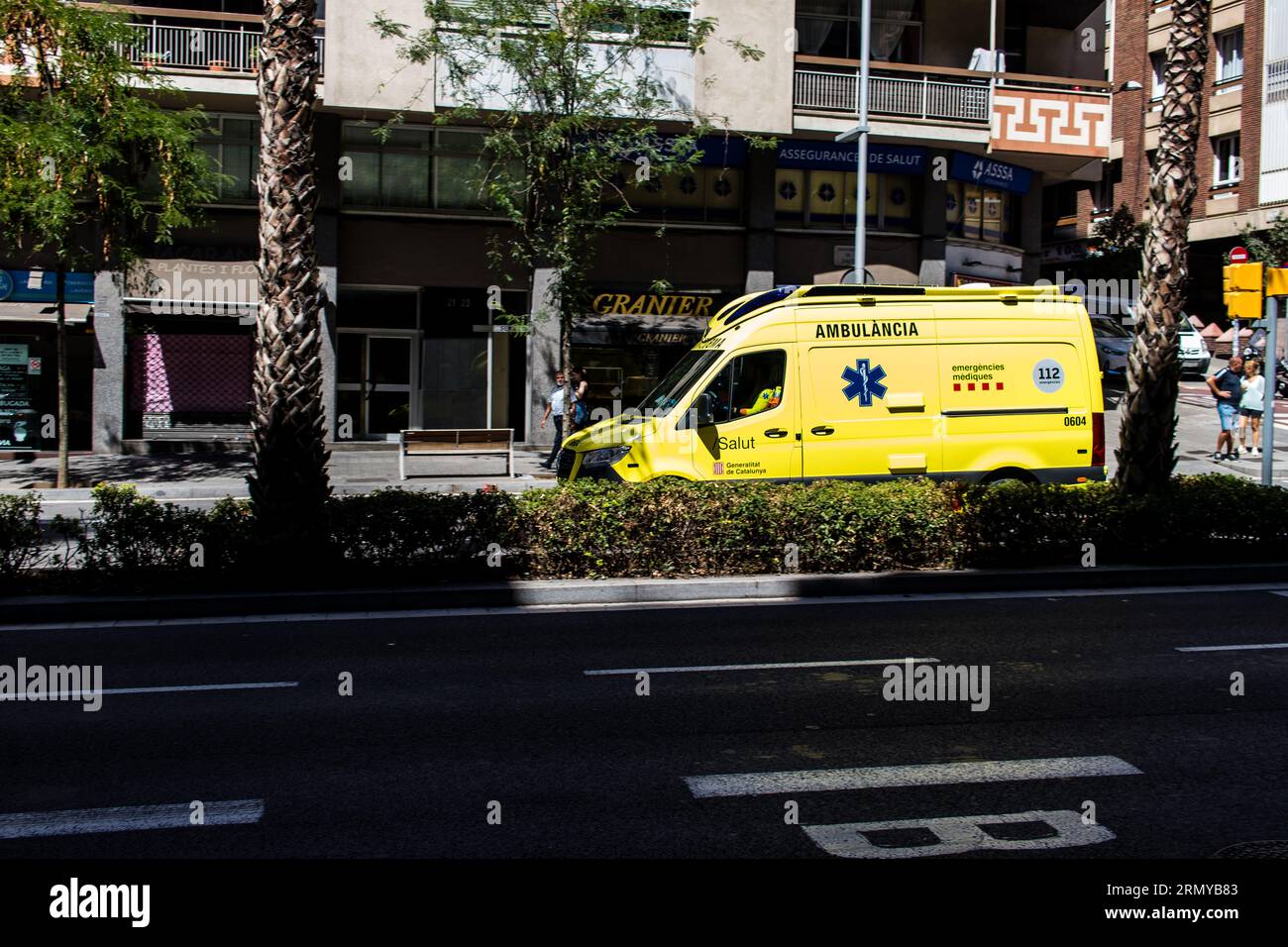 Barcelona, Spain - August 28, 2023 Ambulance driving in the city center ...