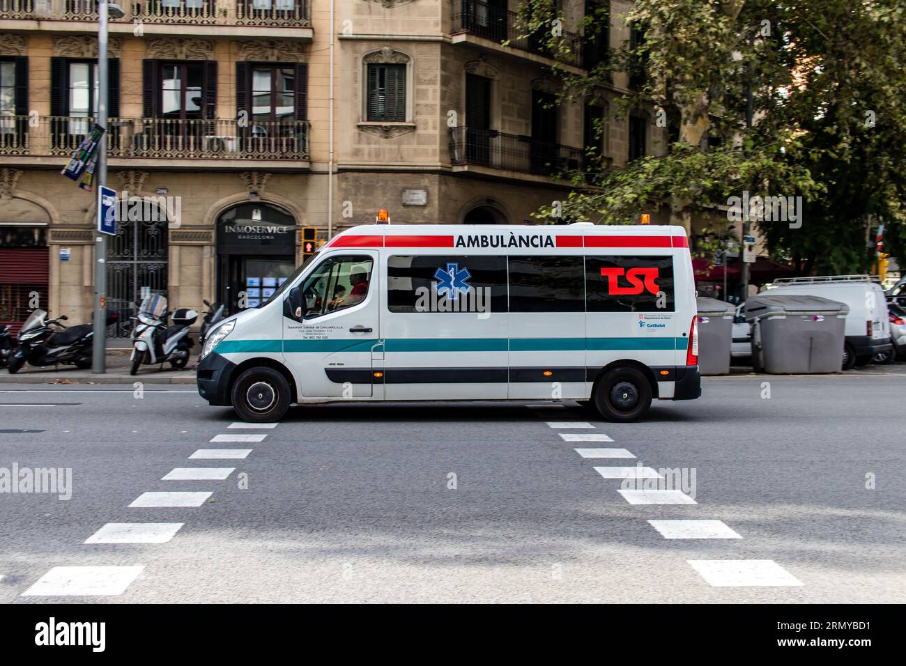 Barcelona, Spain - August 28, 2023 Ambulance driving in the city center ...