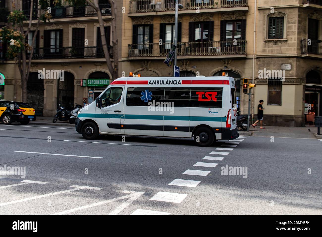Barcelona, Spain - August 28, 2023 Ambulance driving in the city center ...