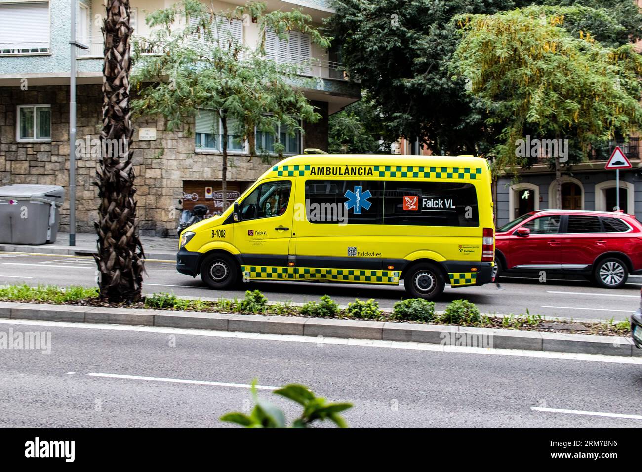 Barcelona, Spain - August 28, 2023 Ambulance driving in the city center ...