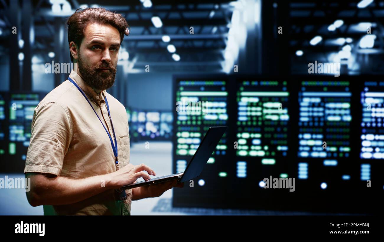 Experienced engineer writing data center disaster recovery plan on ...