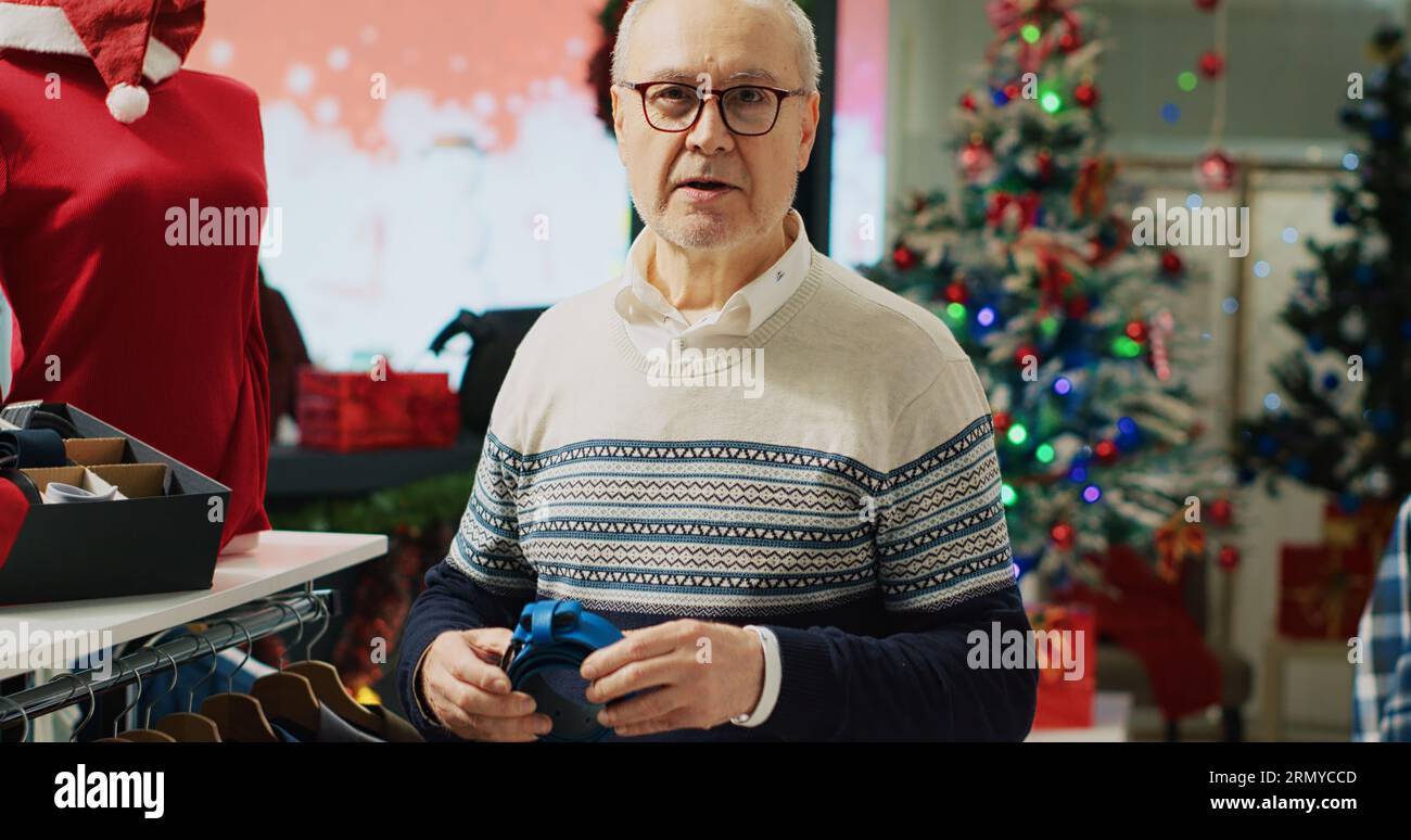 Elderly client looking belts admiring hi-res stock photography and ...