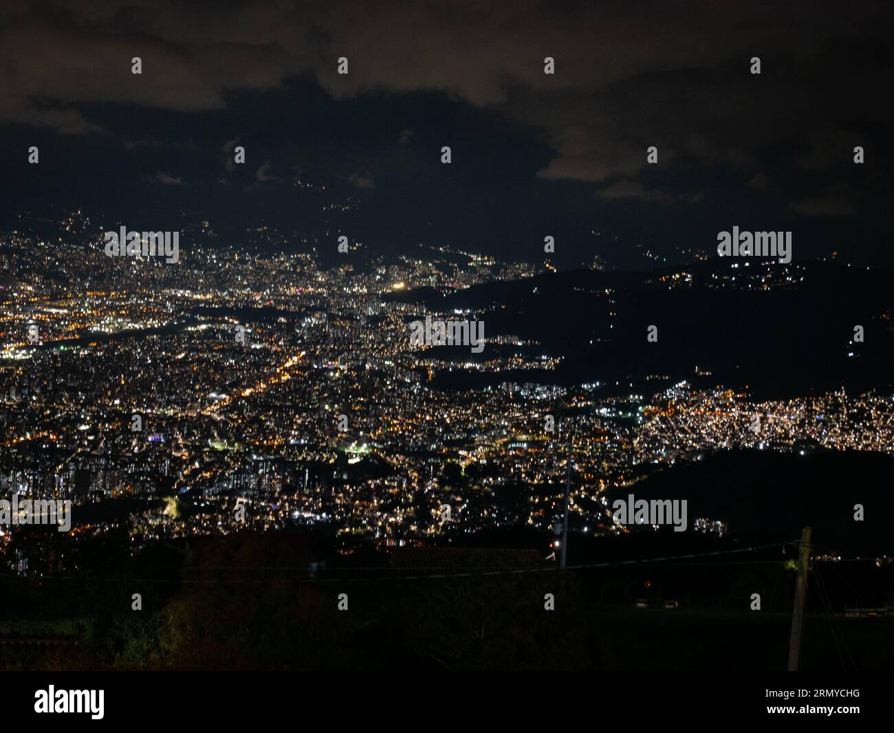 Night City View of Medellin, Colombia with a Cloudy Sky Stock Photo - Alamy