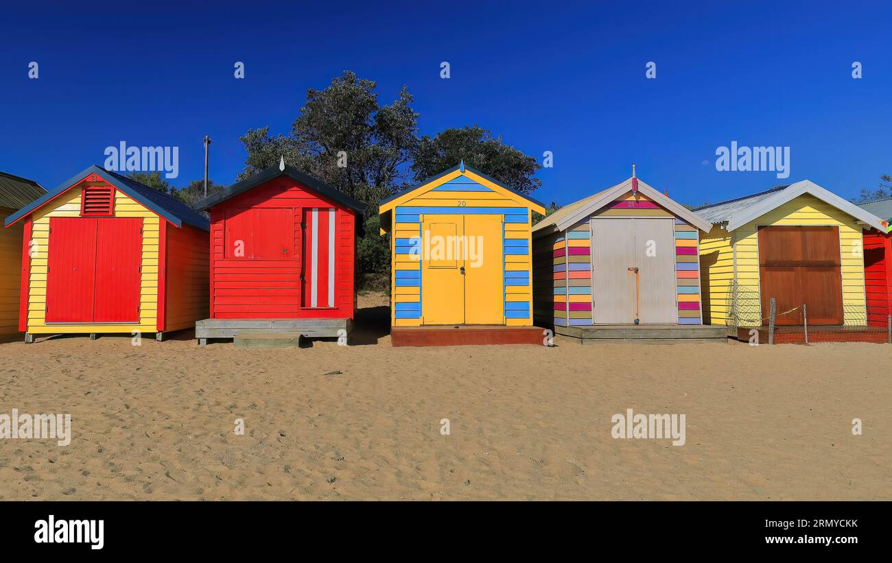 898 Partial run of the 82 brightly painted Victorian bathing boxes on ...