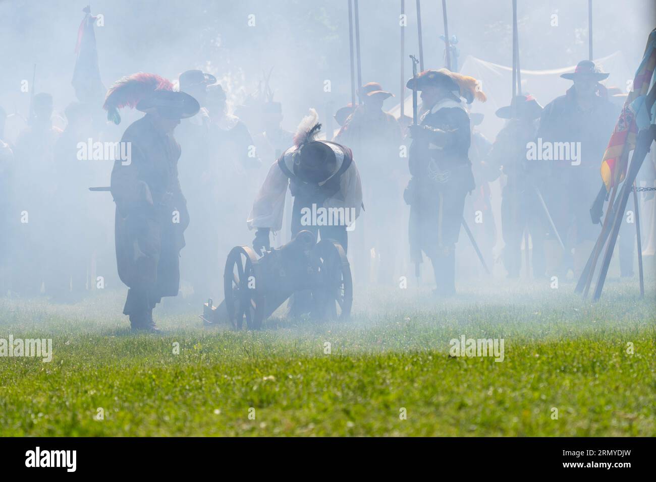 Medieval mercenaries shrouded in gunpowder smoke fire cannons Stock ...
