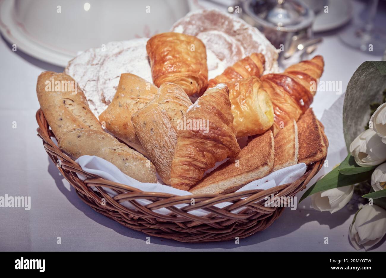 Stock photo of basket with delicious baked goods like bread and ...