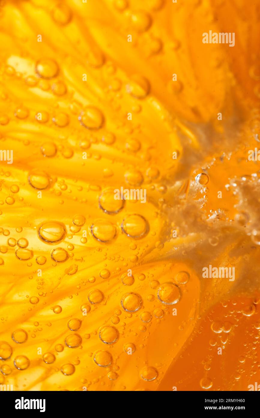 Closeup full frame background of fresh orange slice with pulp in ...