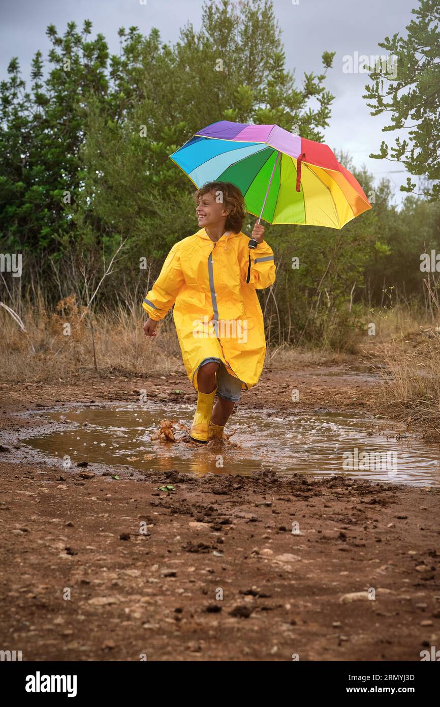 Child walking through mud hi-res stock photography and images - Alamy