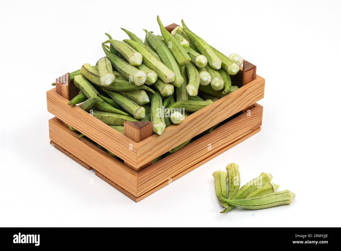 Fresh okra on the wooden container Stock Photo - Alamy