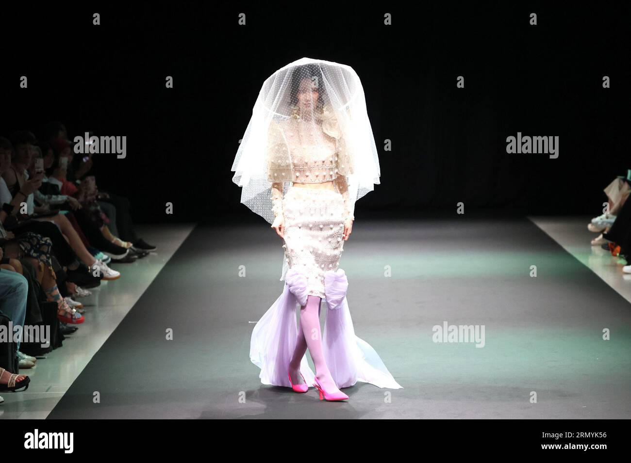 Tokyo, Japan. 30th Aug, 2023. A model displays a creation of "Bench ...