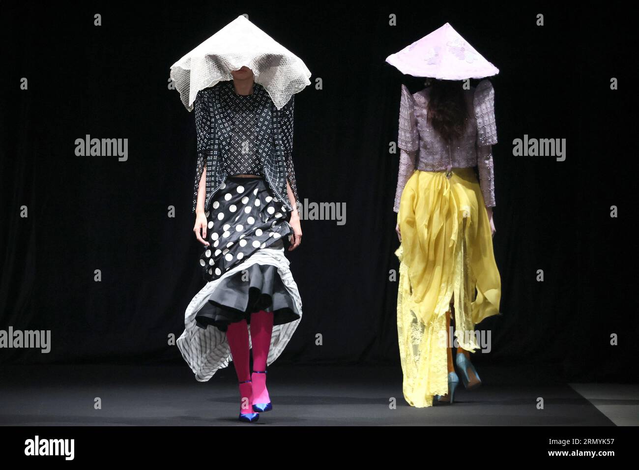 Tokyo, Japan. 30th Aug, 2023. Models display creations of "Bench ...