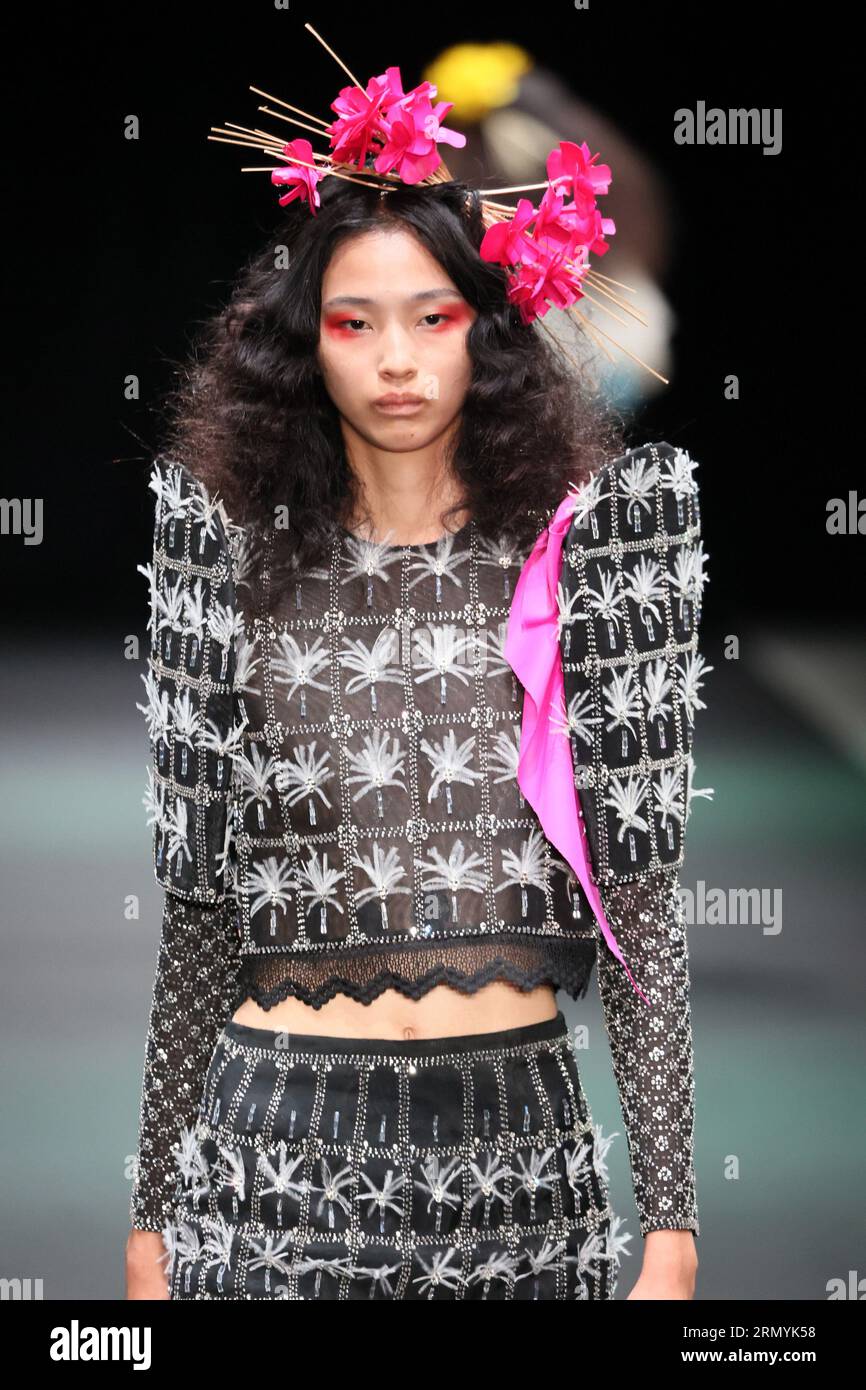 Tokyo, Japan. 30th Aug, 2023. A model displays a creation of "Bench ...