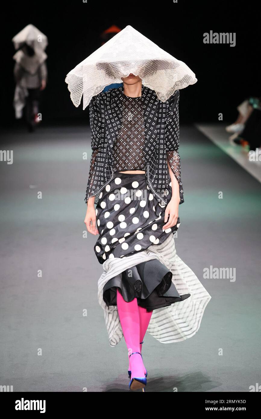 Tokyo, Japan. 30th Aug, 2023. A model displays a creation of "Bench ...