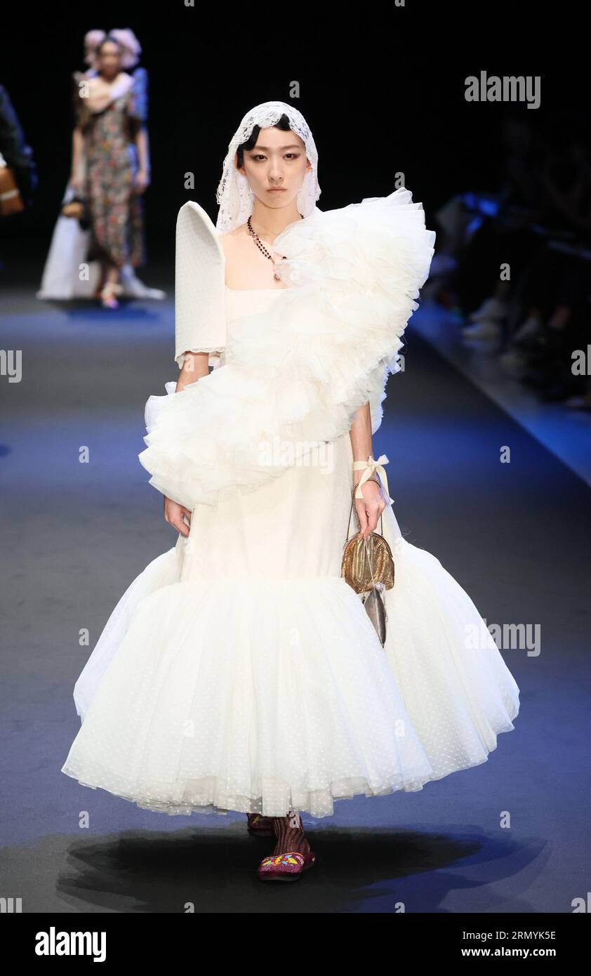 Tokyo, Japan. 30th Aug, 2023. A model displays a creation of "Bench ...
