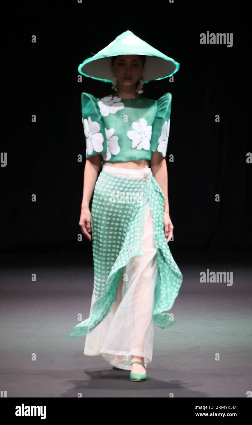 Tokyo, Japan. 30th Aug, 2023. A model displays a creation of "Bench ...