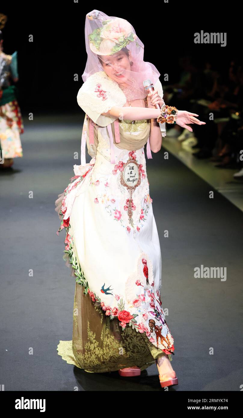 Tokyo, Japan. 30th Aug, 2023. A model displays a creation of "Bench ...