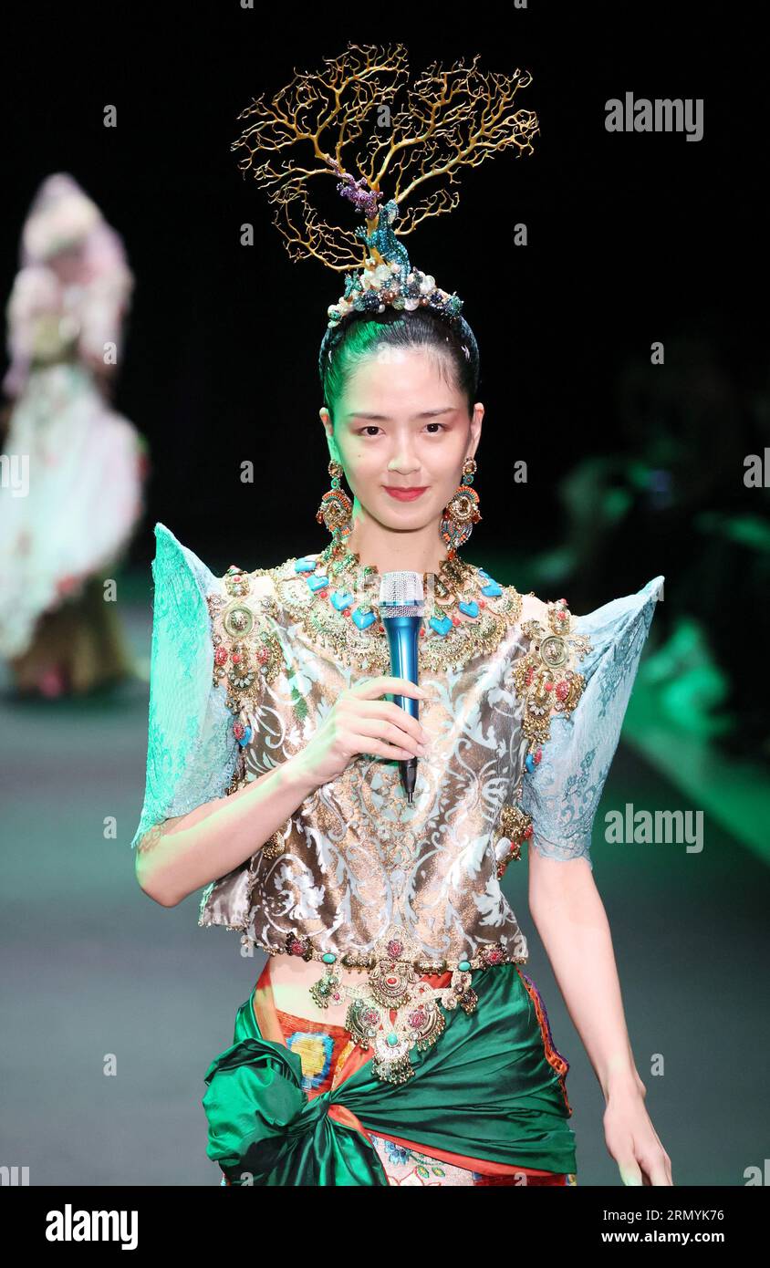Tokyo, Japan. 30th Aug, 2023. A model displays a creation of "Bench ...