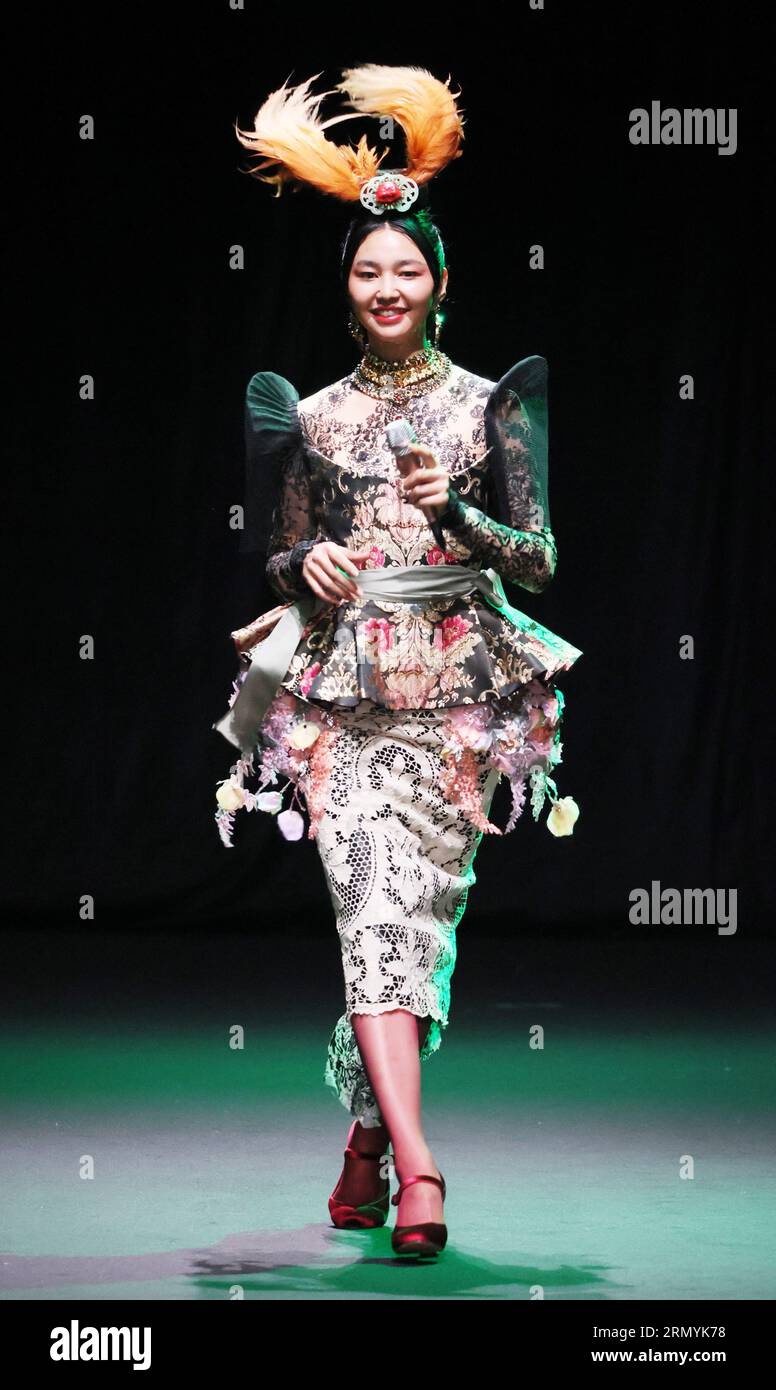 Tokyo, Japan. 30th Aug, 2023. A model displays a creation of "Bench ...