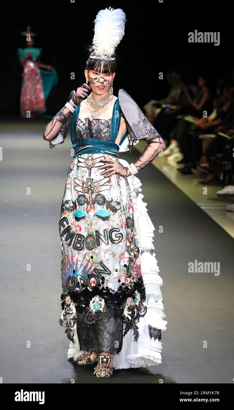Tokyo, Japan. 30th Aug, 2023. A model displays a creation of "Bench ...
