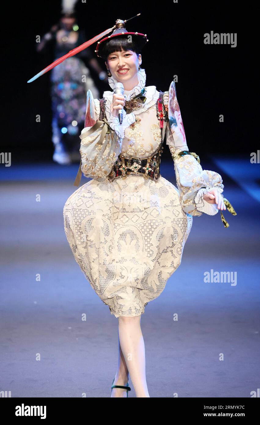 Tokyo, Japan. 30th Aug, 2023. A model displays a creation of "Bench ...