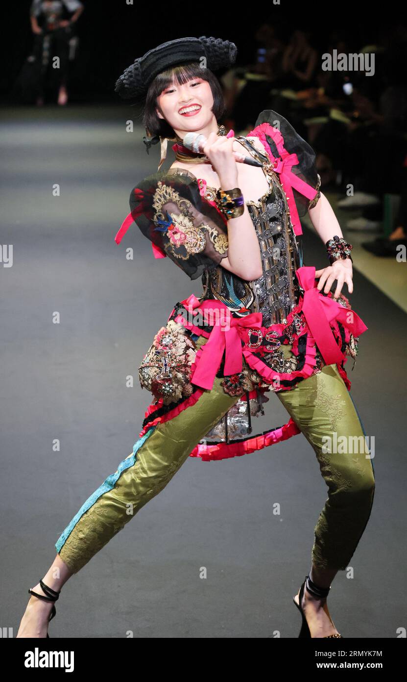 Tokyo, Japan. 30th Aug, 2023. A model displays a creation of "Bench ...