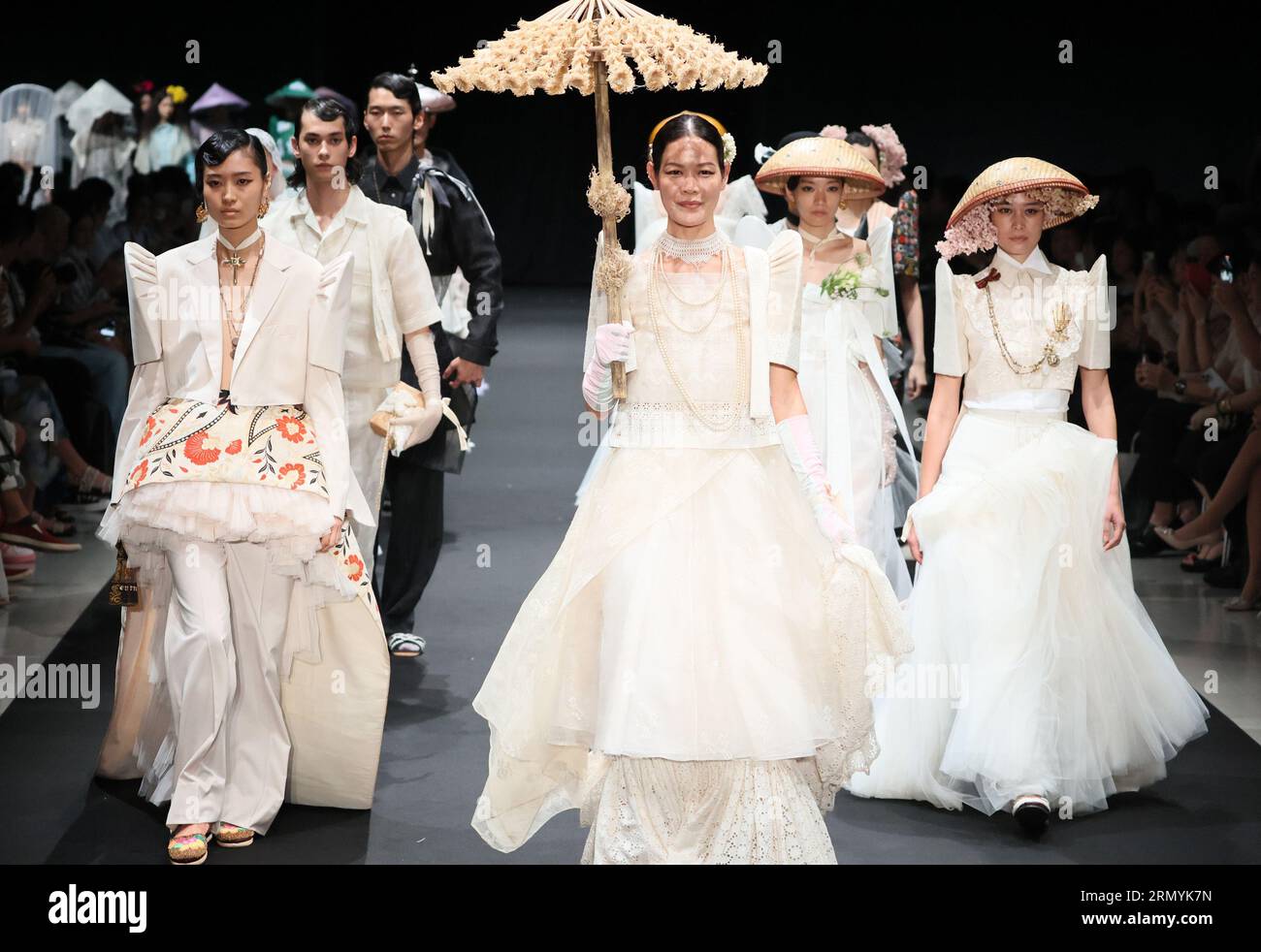 Tokyo, Japan. 30th Aug, 2023. Models display creations of "Bench ...