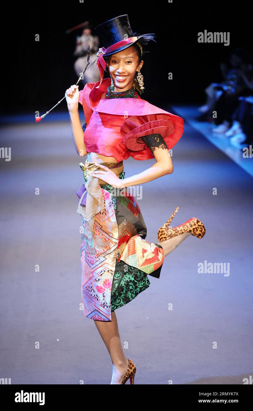 Tokyo, Japan. 30th Aug, 2023. A model displays a creation of "Bench ...