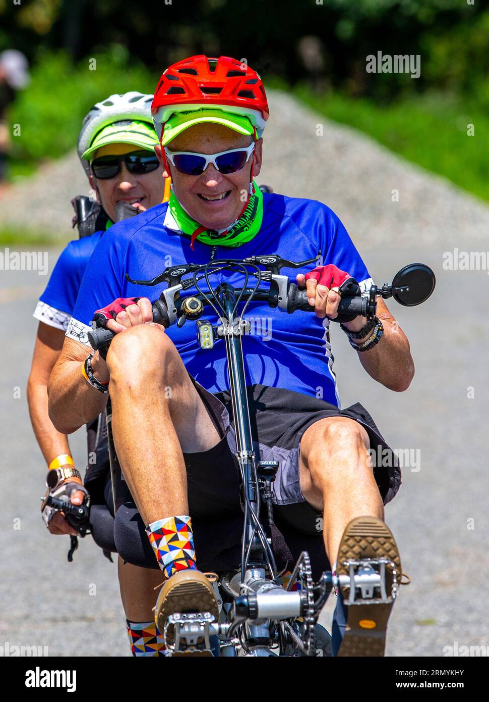 Man and woman riding tandem hi-res stock photography and images - Alamy
