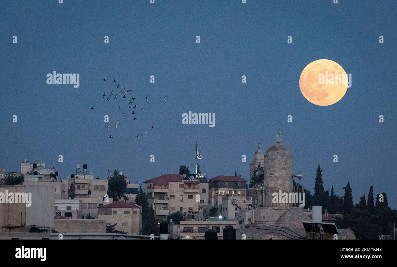 Jerusalem. 30th Aug, 2023. A full moon is seen over Jerusalem, on Aug ...