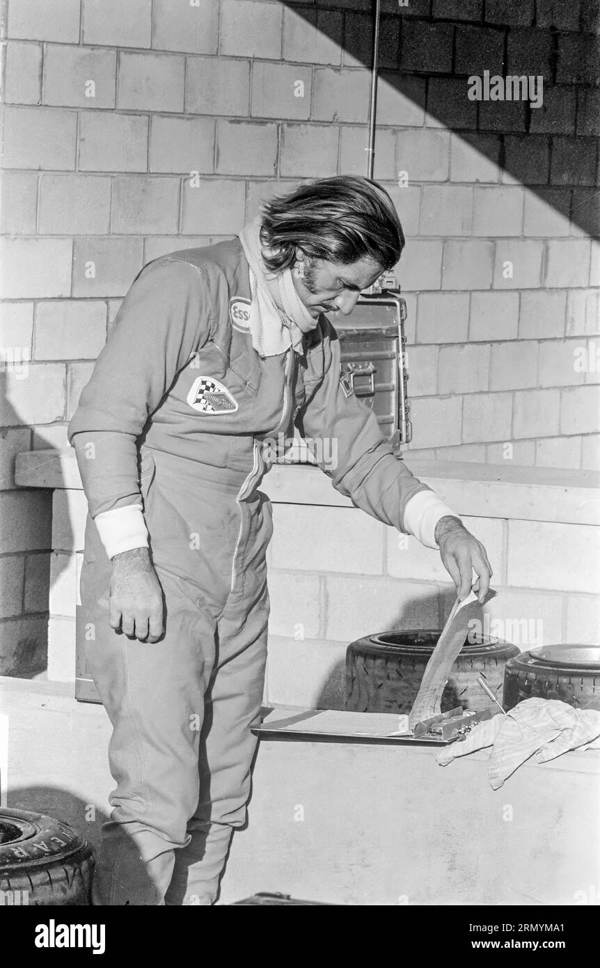 Graham Hill in the pits driving a Brabham BT34 at the 1971 Watkins Glen ...