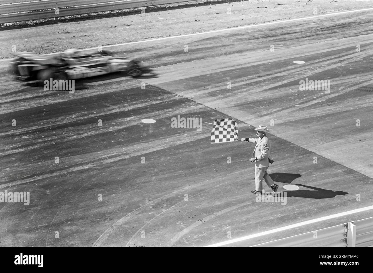 Started Richard Norman (Tex) Hopkins waving the checked flag at the ...