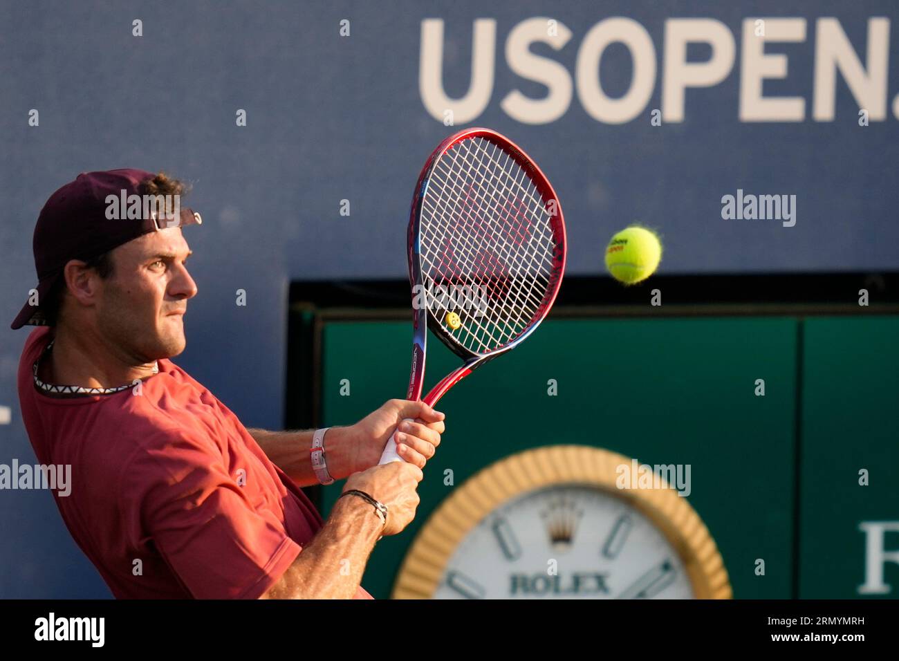 Tommy Paul, of the United States, returns a shot to Roman Safiullin, of ...