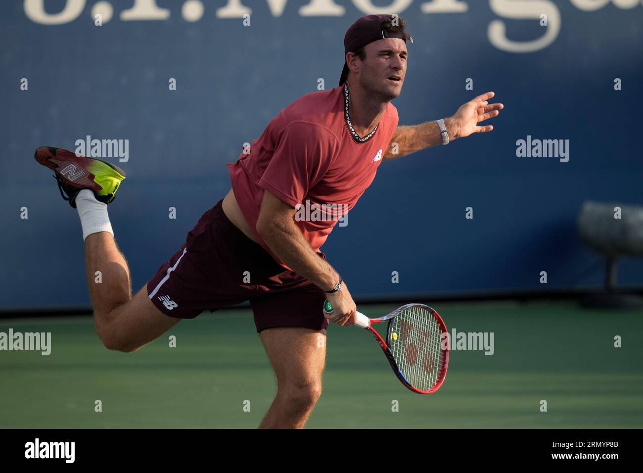 Tommy Paul, of the United States, serves to to Roman Safiullin, of ...