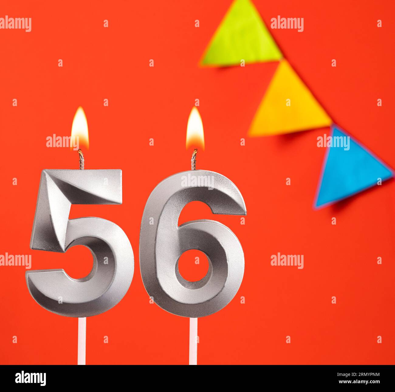 Birthday card - Number 56 candle in orange background Stock Photo - Alamy